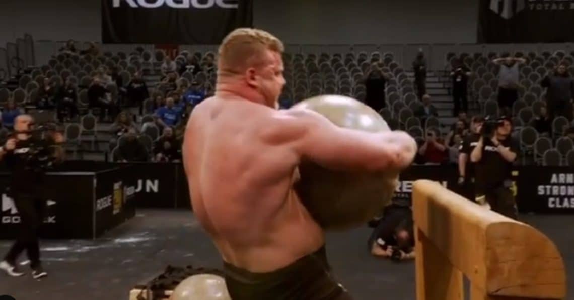 Tom Stoltman Conquers 602lb Manhood Stone World Record at Arnold ...