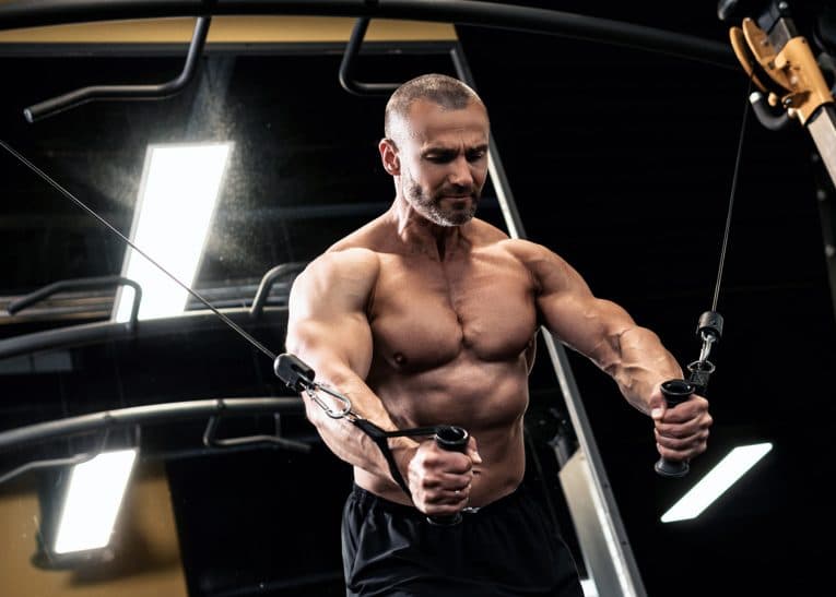 Pec Deck Guide: Muscles Worked, How-To, Benefits, Tips, and ...