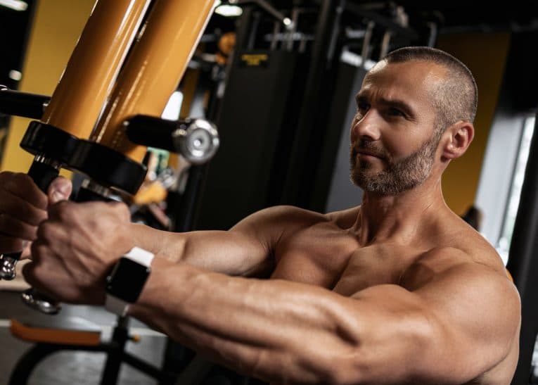 Pec Deck Guide: Muscles Worked, How-To, Benefits, Tips, and ...