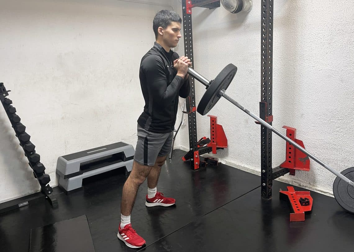 Master Landmine Squats: Target Your Quads, Glutes, and Core!