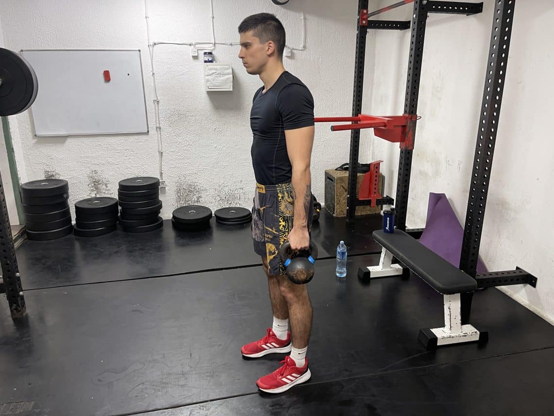 Suitcase Squat Exercise Guide: Muscles Worked, Benefits, Alternatives