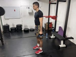 Suitcase Squat Exercise Guide: Muscles Worked, Benefits, Alternatives