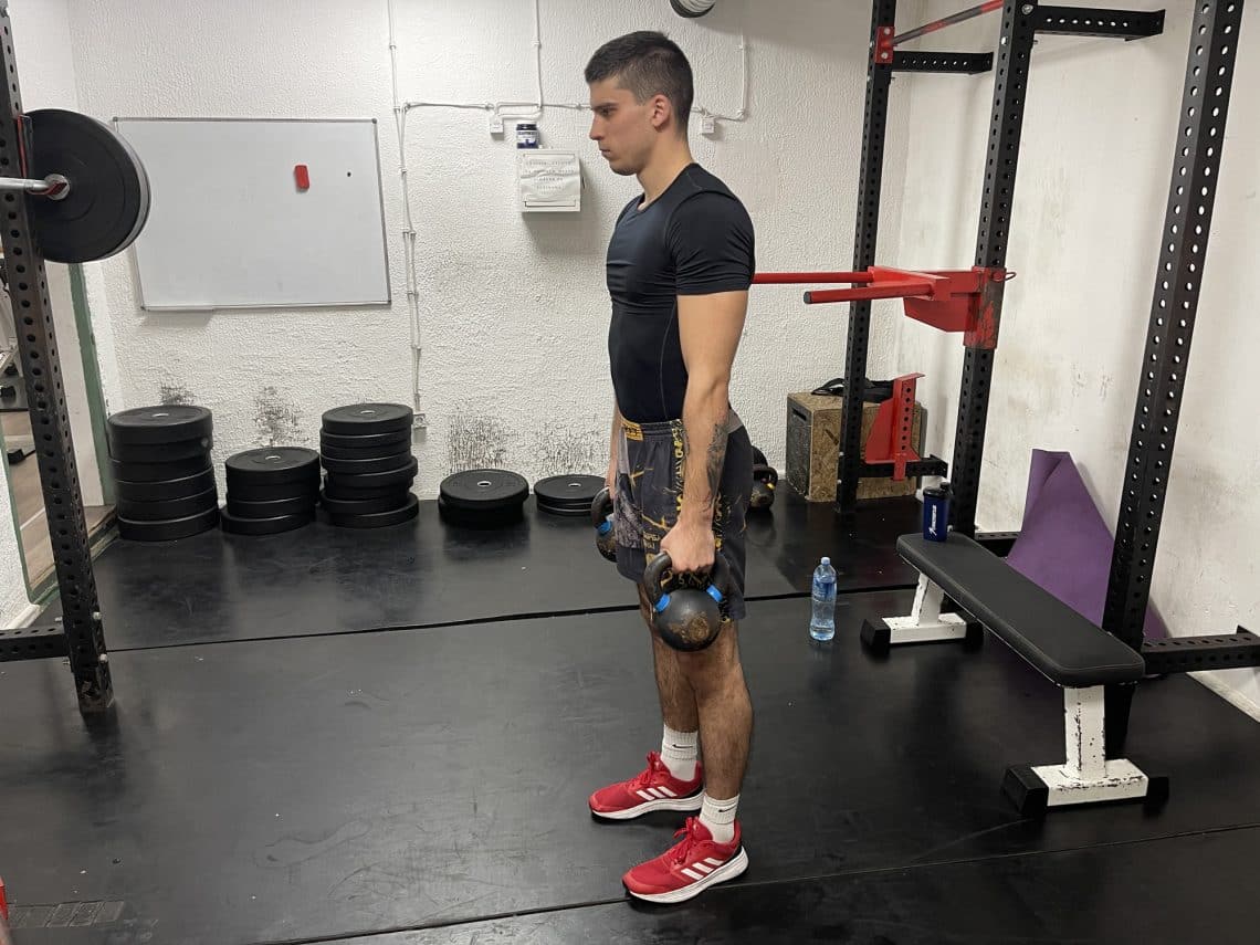 Suitcase Squat Exercise Guide: Muscles Worked, Benefits, Alternatives