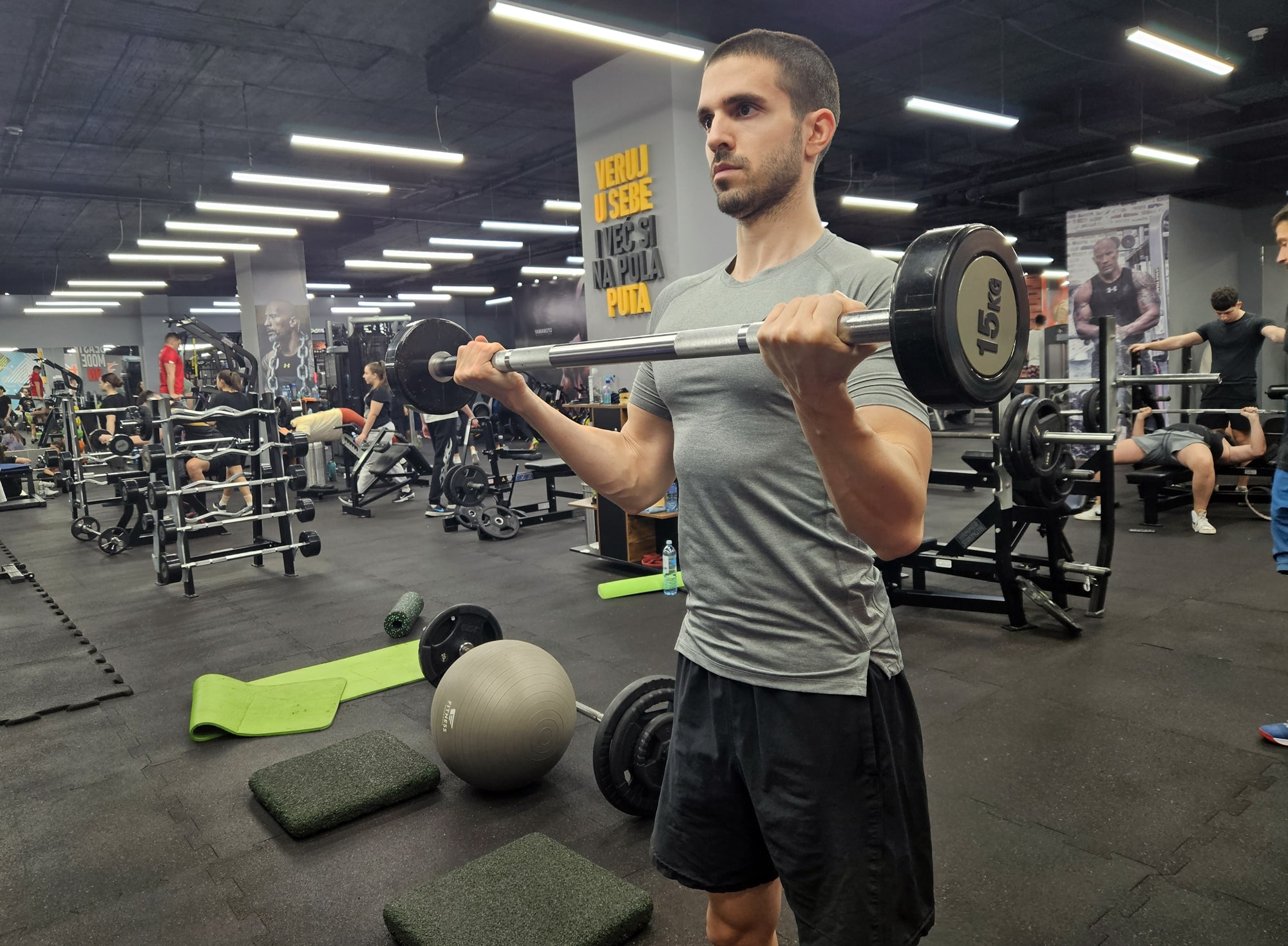 Wide Grip Barbell Curl Guide: How To, Benefits, Mistakes, Alternatives