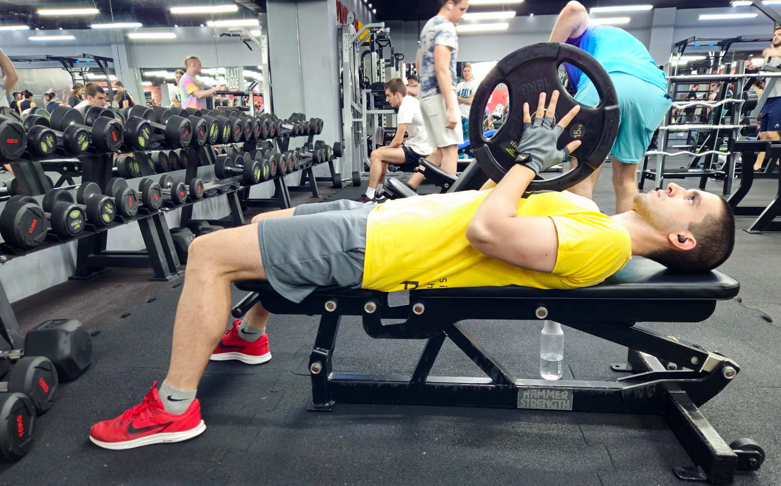 Plate Press Guide: How To, Benefits, Muscles Worked, Mistakes