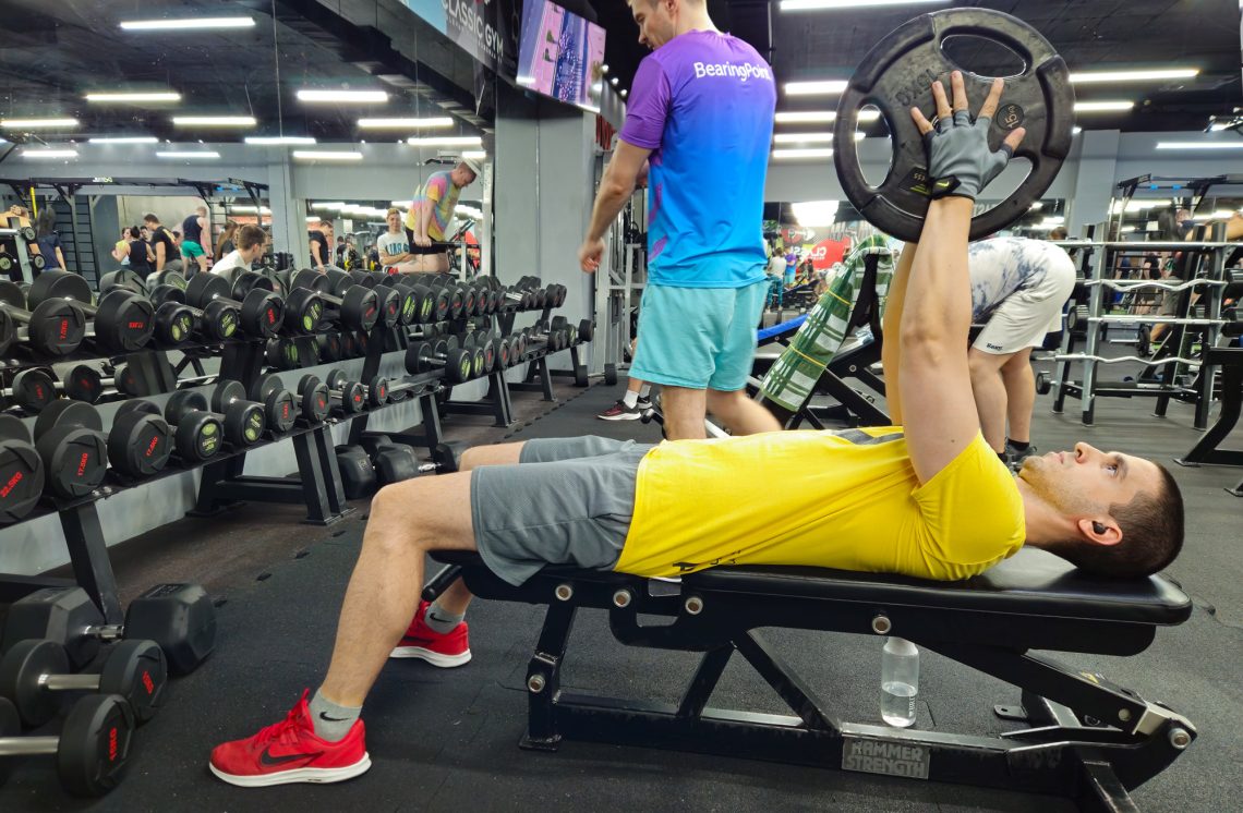 Plate Press Guide: How To, Benefits, Muscles Worked, Mistakes