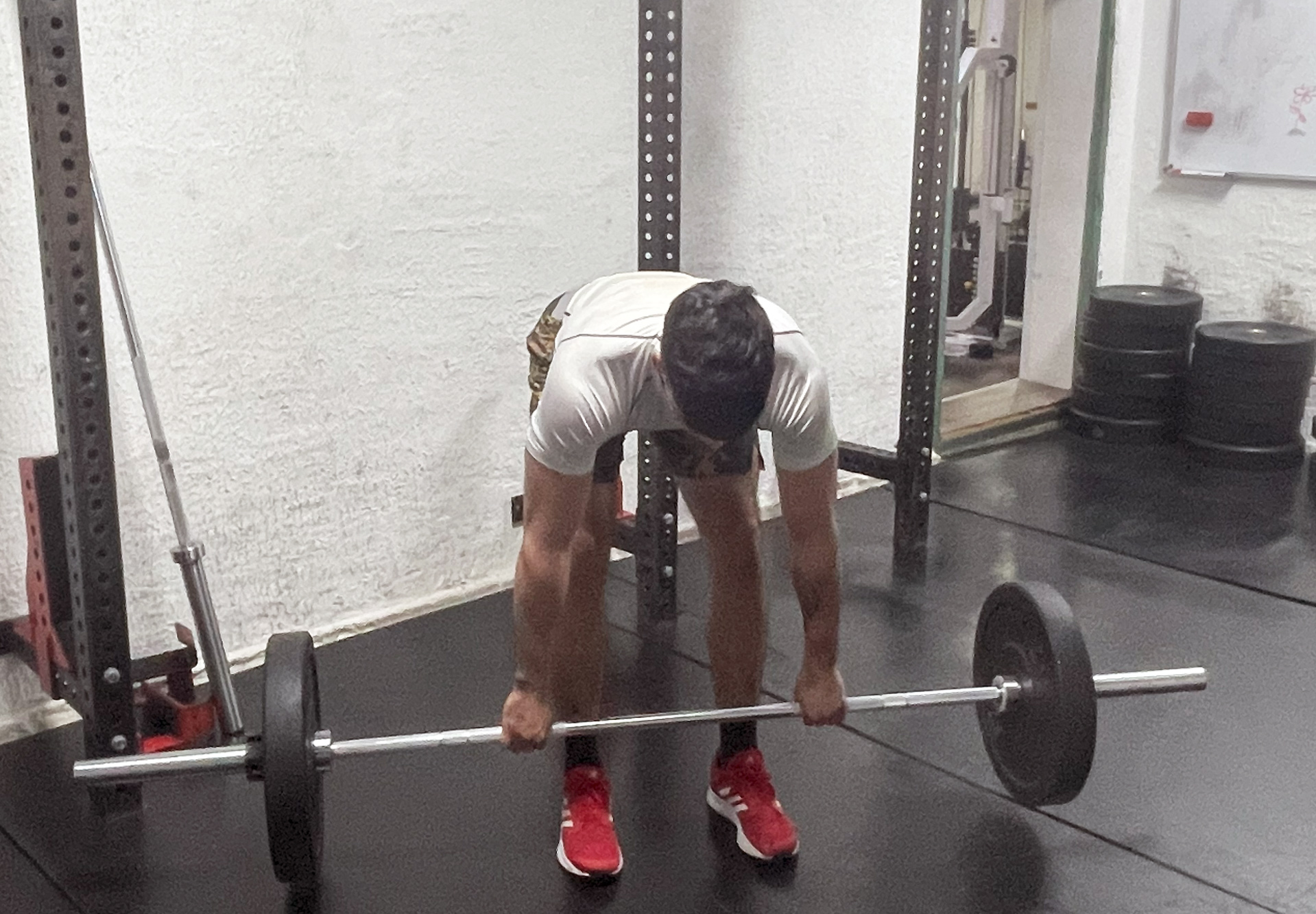 Dorian Deadlift Exercise Guide: How To, Muscles Worked, & Alternatives