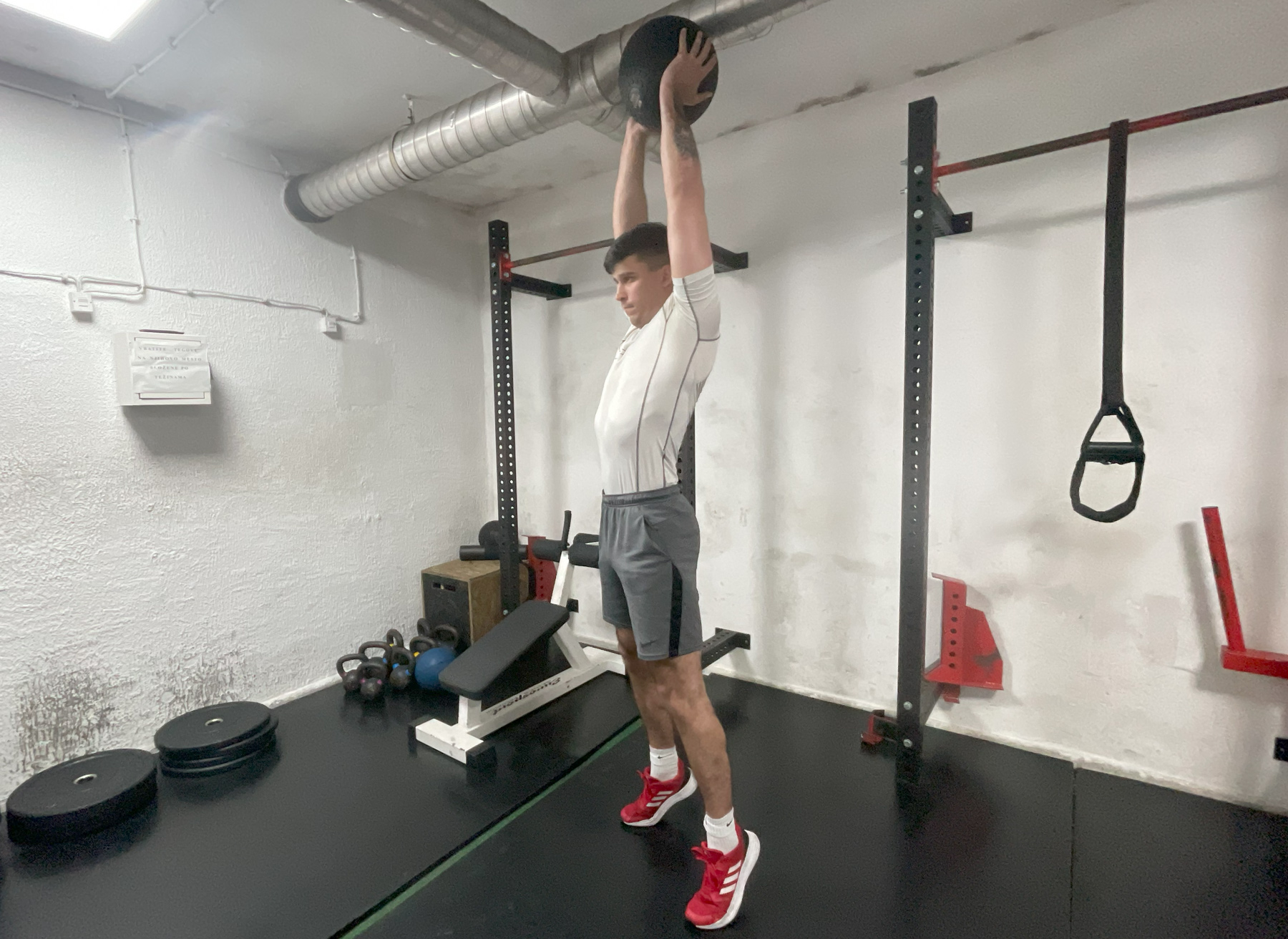 Medicine Ball Slam Guide: How To, Muscles Worked, Benefits, Alternatives