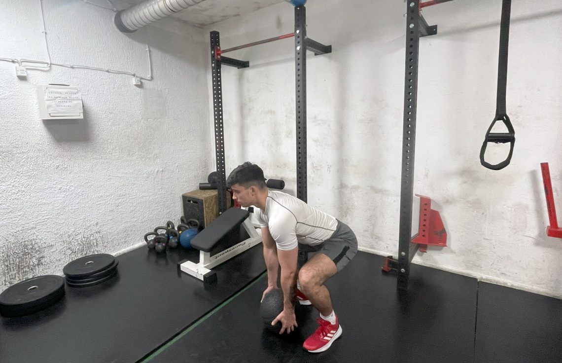 Medicine Ball Slam Guide: How To, Muscles Worked, Benefits, Alternatives